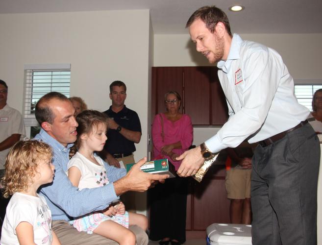 Habitat opens new home | The Daily Sun | yoursun.com