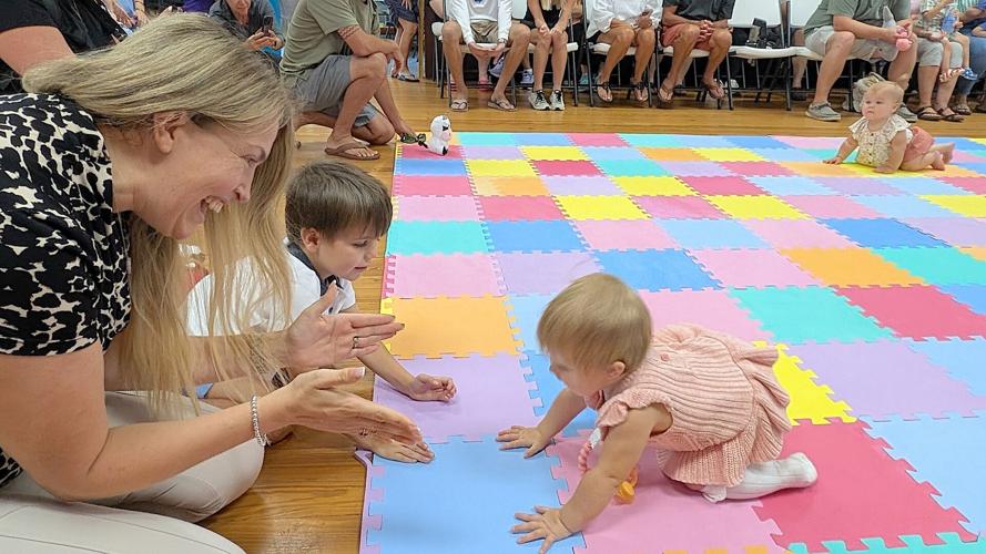 Crawling to victory: Girls win the 2025 Diaper Derby race | News ...