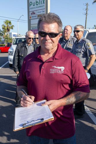 Law enforcement torch run for Special Olympics | Multimedia | yoursun.com