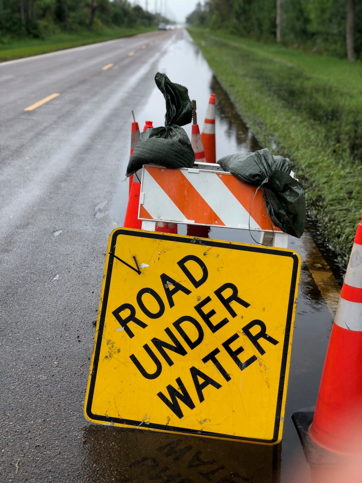 River Road, flooded and crumbling, poses hazards to drivers | News ...