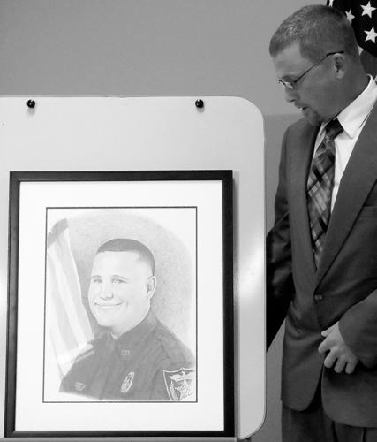 Artist dedicates work to Sgt. Wilson’s family | News Archives | yoursun.com