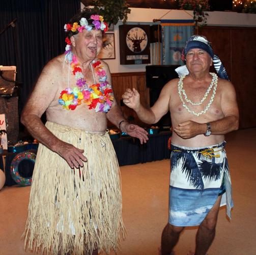 Grass skirts, coconuts and a surprise wedding reception for Ballroom ...