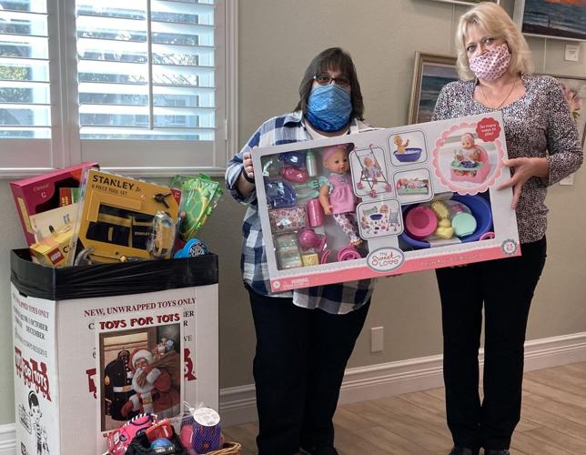 Englewood Bank employees, customers give to Toys for Tots | | yoursun.com