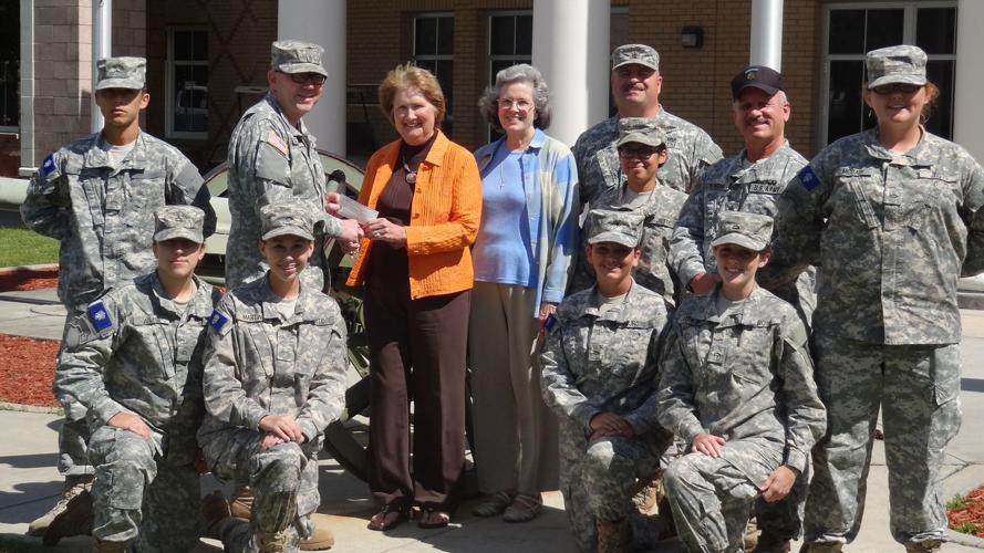 Needlework Guild presents check to Summerlin Academy | Newsarchives ...