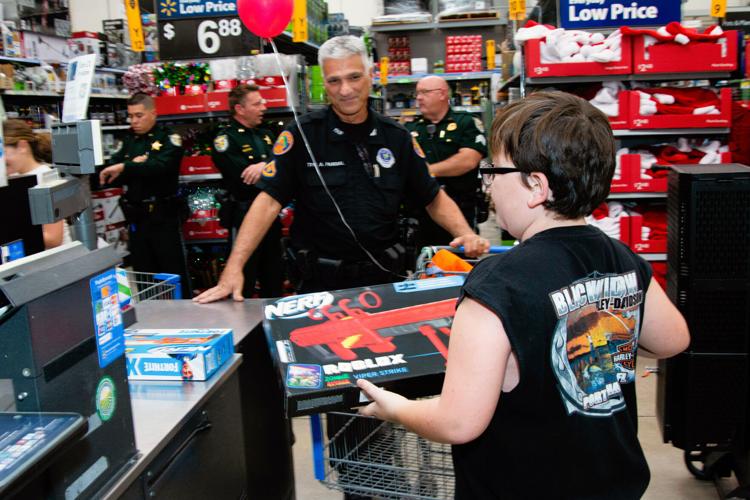 'Shop with a Cop' pairs kids with law enforcement for holiday gift ...