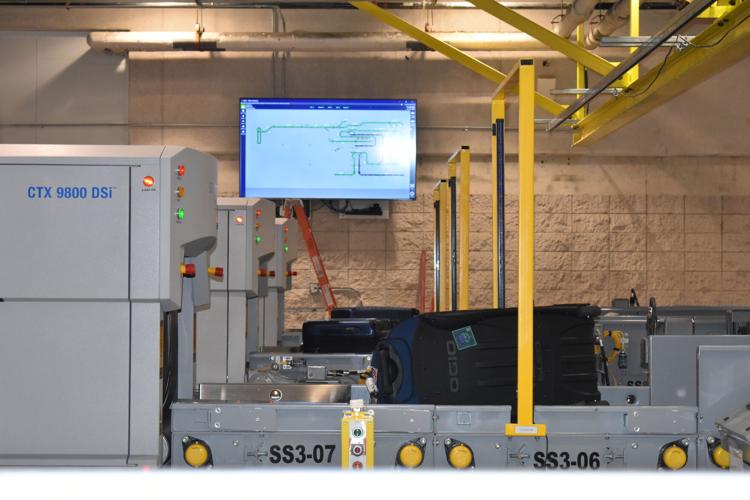 SRQ reveals $50 million automated baggage claim system | News | yoursun.com