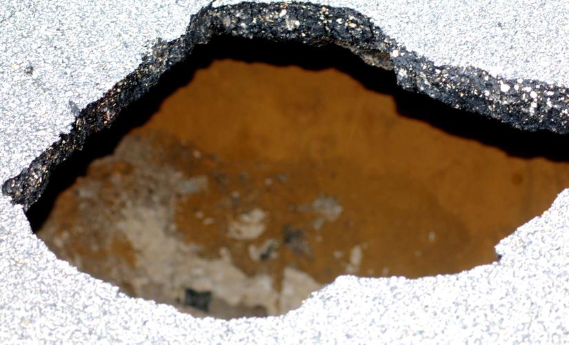 What Lies Beneath: Dipping road points to deeper problems buried under ...