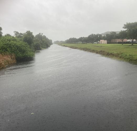 WITH PHOTOS: Latest: Portion of interstate has washout in North Port ...