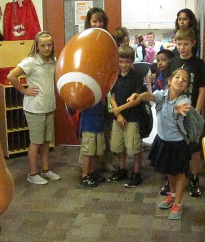 Football players promote reading at Peace River | News Archives ...