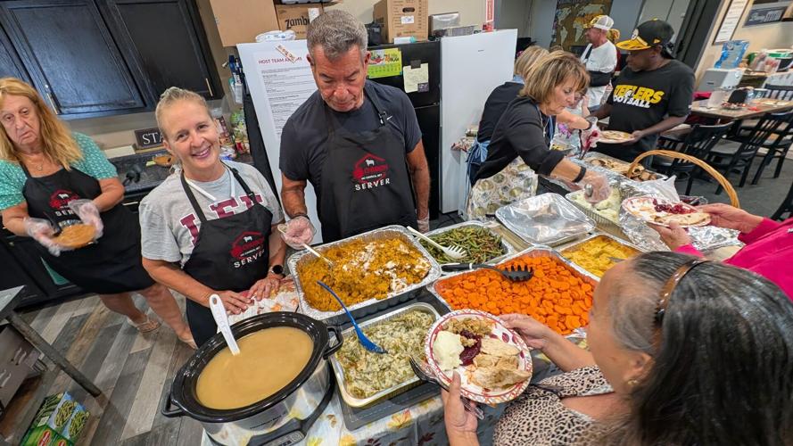 SERVING UP LOVE: Volunteers are the heart of Thanksgiving | News ...