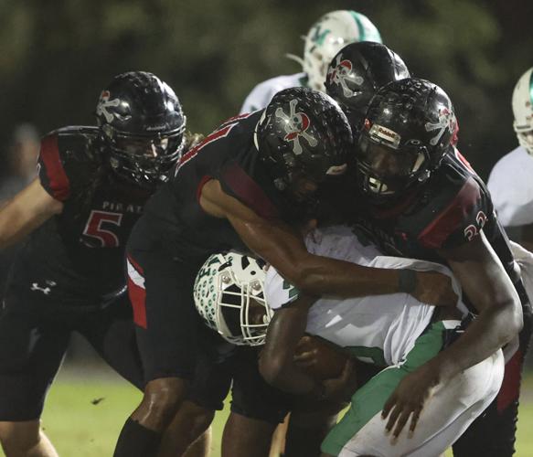 PREP FOOTBALL: Pirates 'perform for the city' in cathartic win | Sun ...