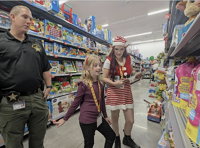 Kids, cops shop: Long-running program pairs students, law enforcement ...