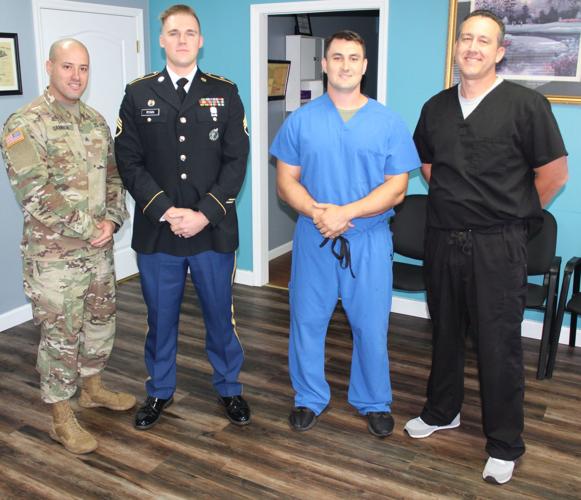 Making it official: Dr. Crupi administers oath to Army Reserve recruit ...