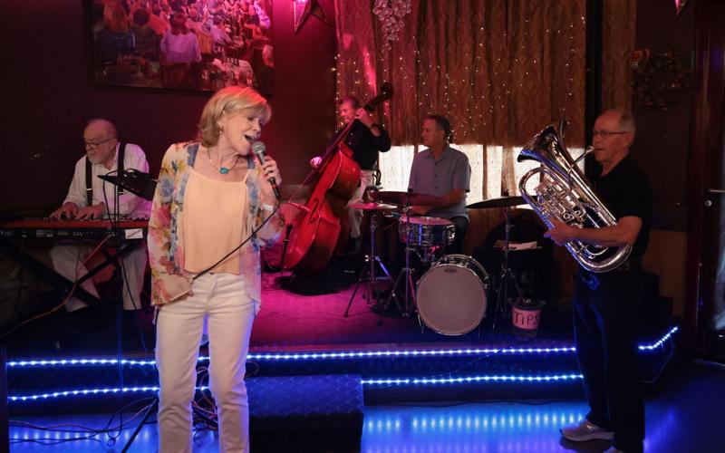 North Port vocalist also makes music with her paintbrush | News ...