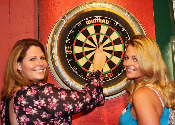 Dart tourney benefits CARE | News Archives | yoursun.com