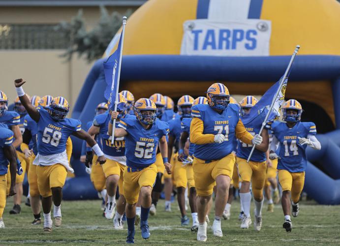 PREP FOOTBALL: Gang's all here: Flaherty's return fuels Tarpons | Sun ...