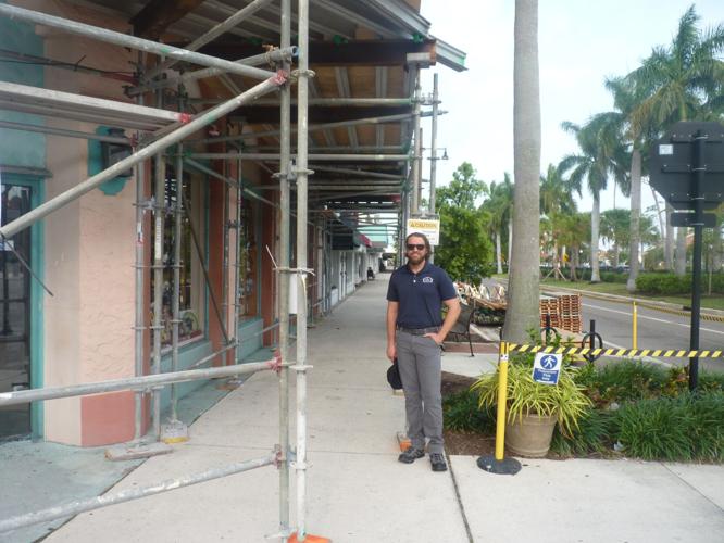 Scaffolding envelopes Johnson-Schoolcraft Building in downtown Venice ...