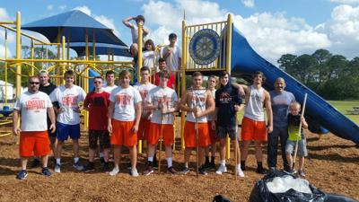 LBHS Manta Ray football team helps clean up Englewood | Features ...